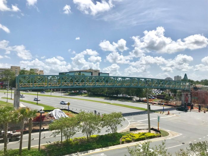 Pedestrian Bridge Installed Connecting New Parking Garage and Disney ...