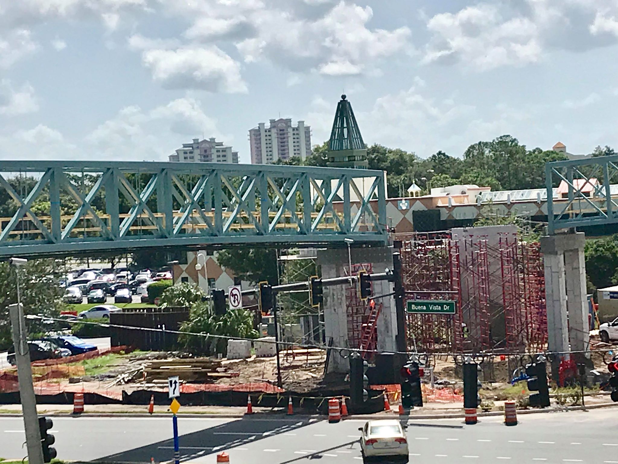 Pedestrian Bridge Installed Connecting New Parking Garage and Disney ...