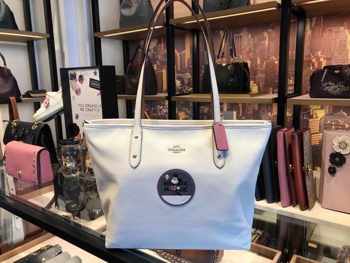 New Minnie Mouse Coach Collection Spotted At Disney Springs | Chip and ...