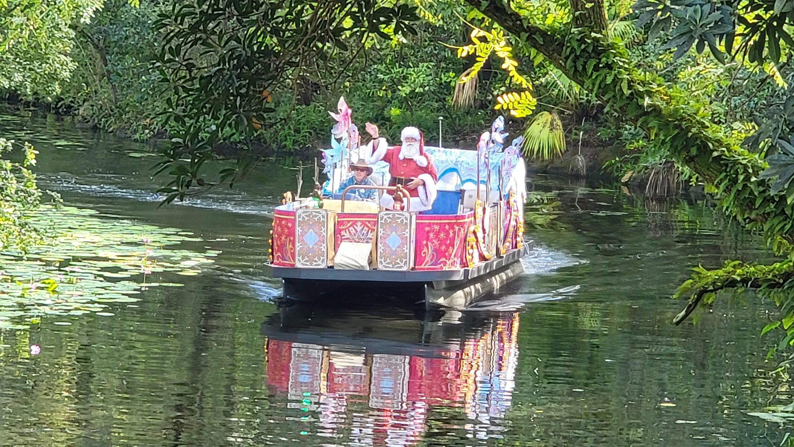 Santa Arrives on the Christmas Floatilla at Disney's Animal Kingdom ...