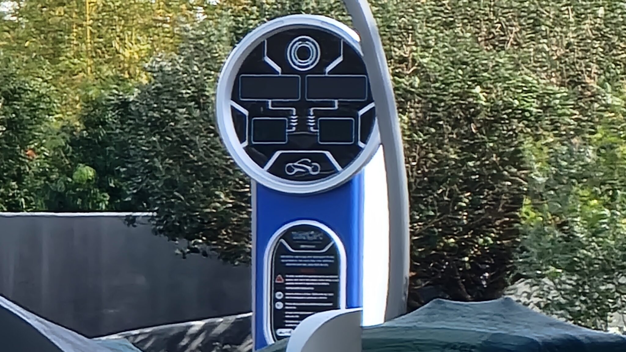 Closer Look at the Tron Lightcycle Run Sign and Entrance | Chip and Company
