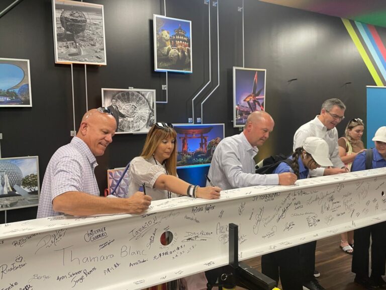 Disney Cast Members Sign Steel Beam Used in EPCOT Construction | Chip ...