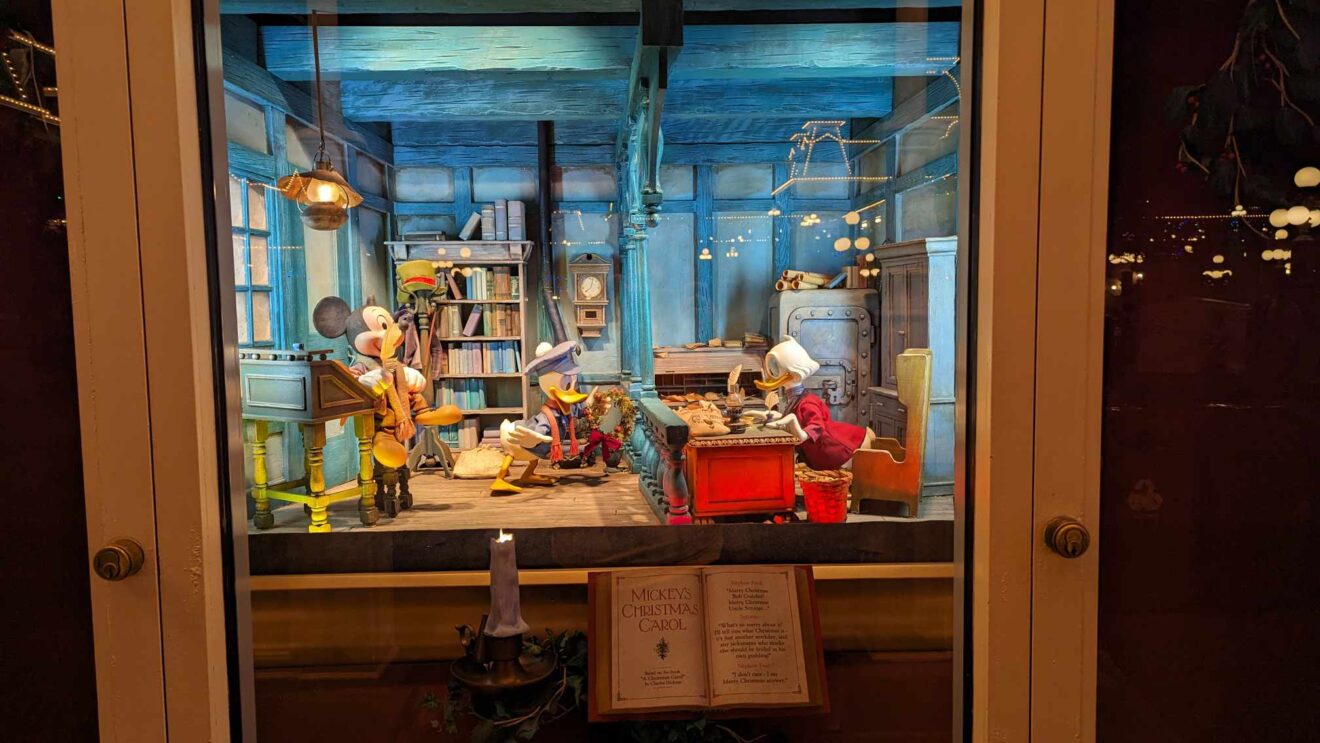 Mickey's Christmas Carol Windows on Display in the Magic Kingdom | Chip ...