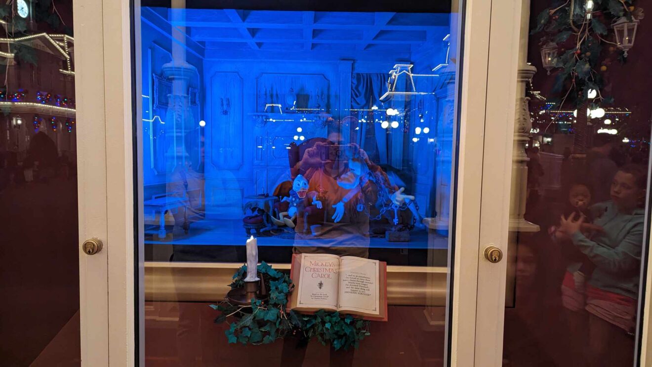 Mickey's Christmas Carol Windows on Display in the Magic Kingdom | Chip ...