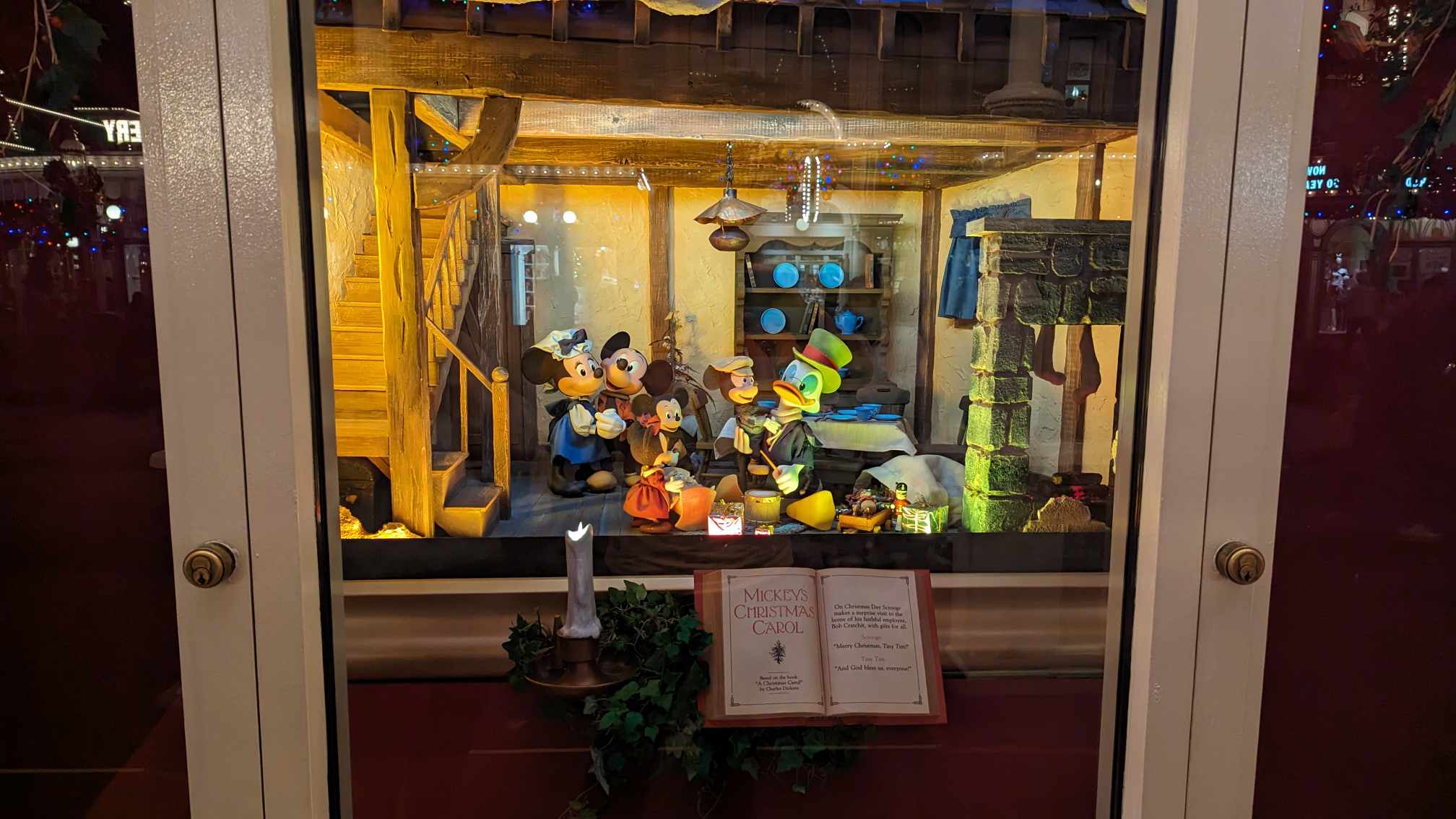 Mickey's Christmas Carol Windows on Display in the Magic Kingdom | Chip ...