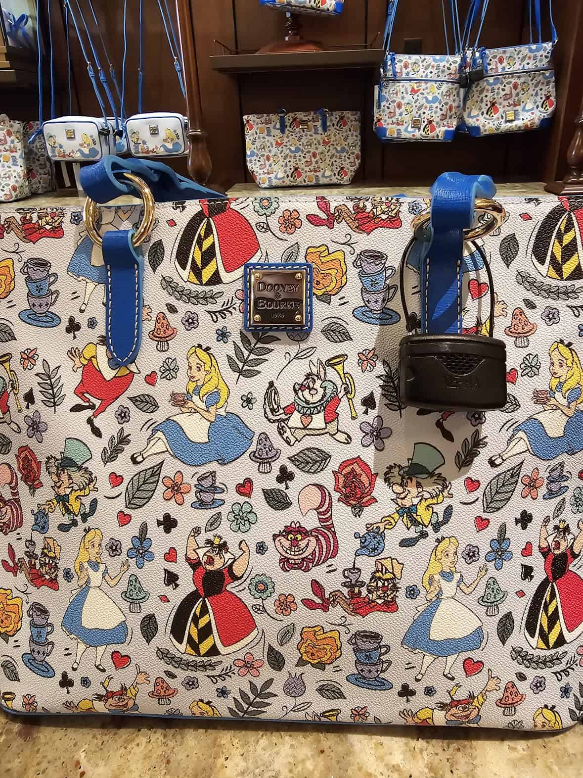 Whimsical Alice In Wonderland Dooney And Bourke Collection Now At Magic ...