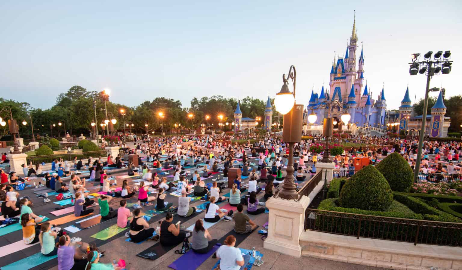 Disney World Cast Members Celebrate International Yoga Day in front of ...