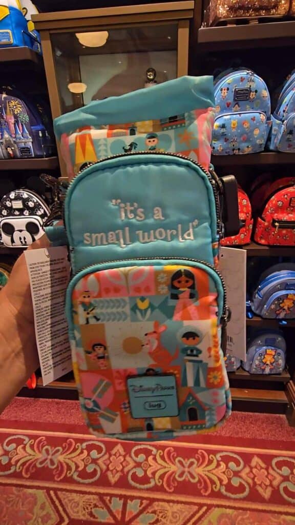 A Splash Of Magic: It's Small World Water Bottle Holder! | Chip and Company