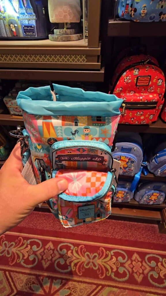 A Splash Of Magic: It's Small World Water Bottle Holder! | Chip and Company