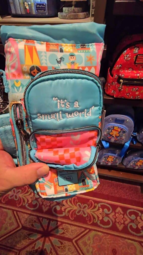A Splash Of Magic: It's Small World Water Bottle Holder! | Chip and Company