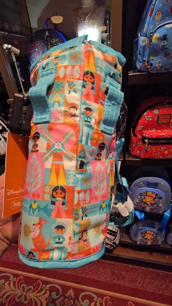 A Splash Of Magic: It's Small World Water Bottle Holder! | Chip and Company