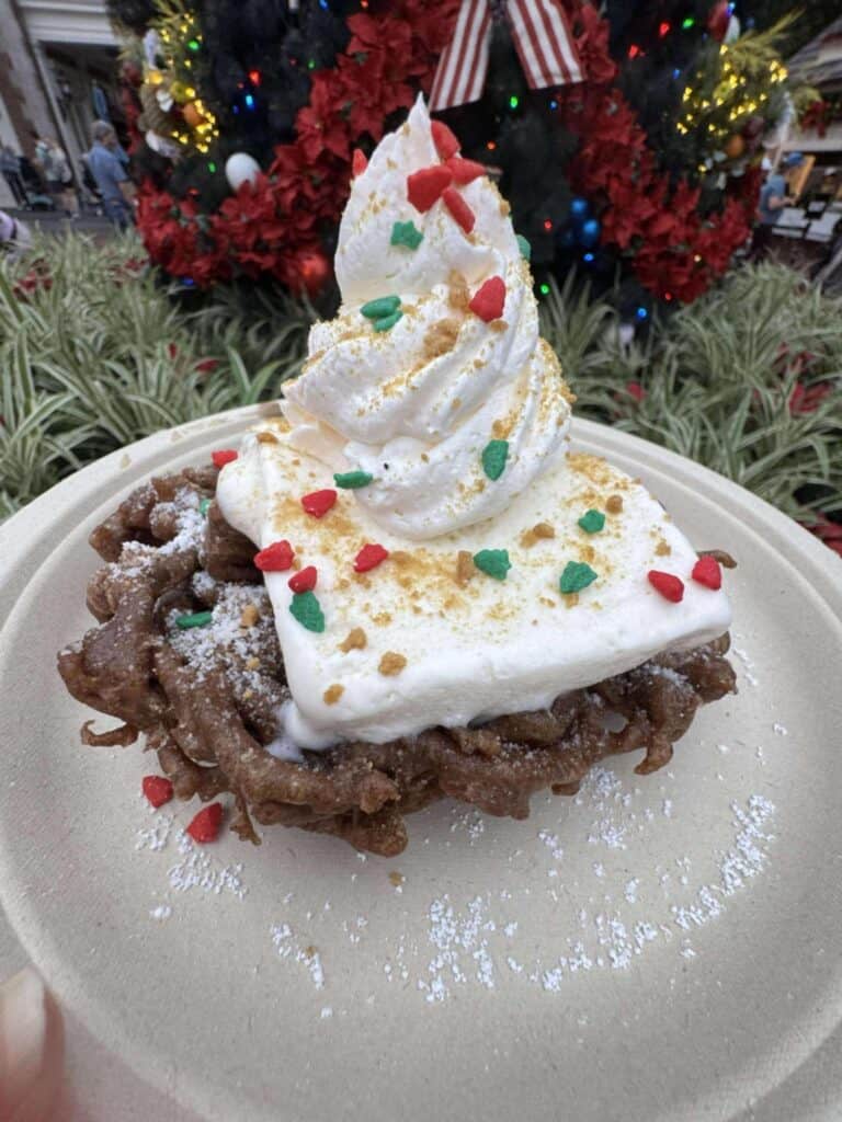 Gingerbread Funnel Cake is a Sweet Treat at 2024 EPCOT Festival of the Holidays | Chip and Company